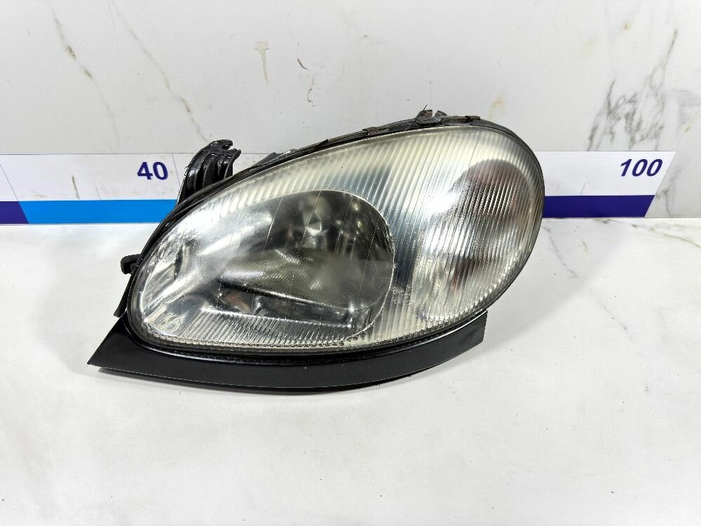 Фара левая Chevrolet Lanos