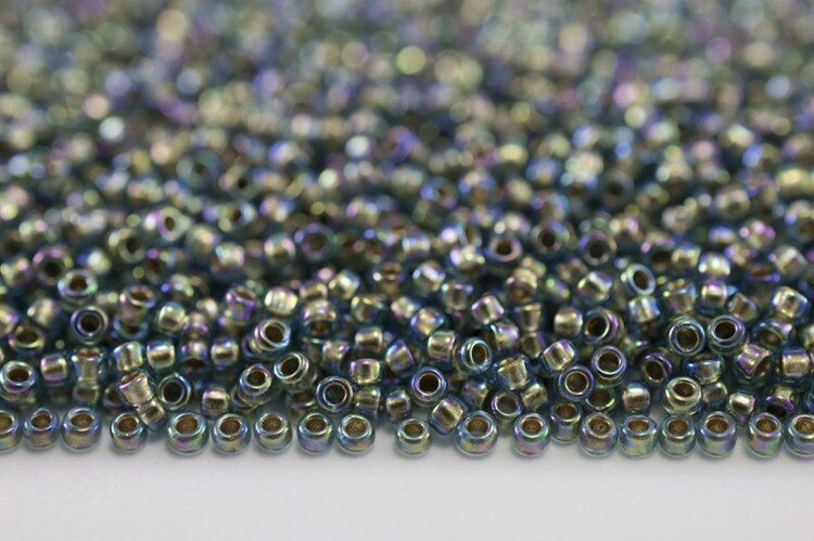 Бисер японский TOHO круглый 15/0 #0995 морская вода радужный, золотая линия внутри, 10 грамм