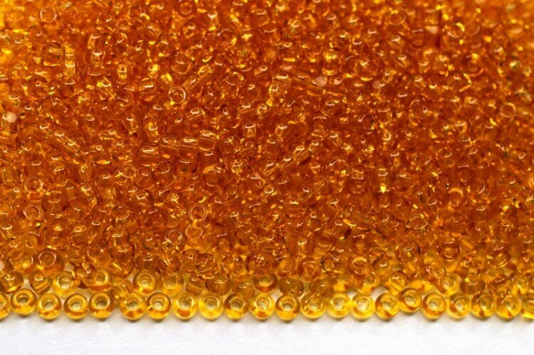 Бисер чешский PRECIOSA Граненый Шарлотта 11/0 10050 янтарный прозрачный, около 10 грамм