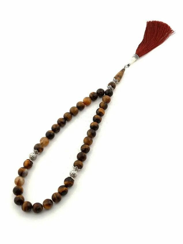 Четки из тигрового глаза 33 бусины, диаметр бусины 12 мм.