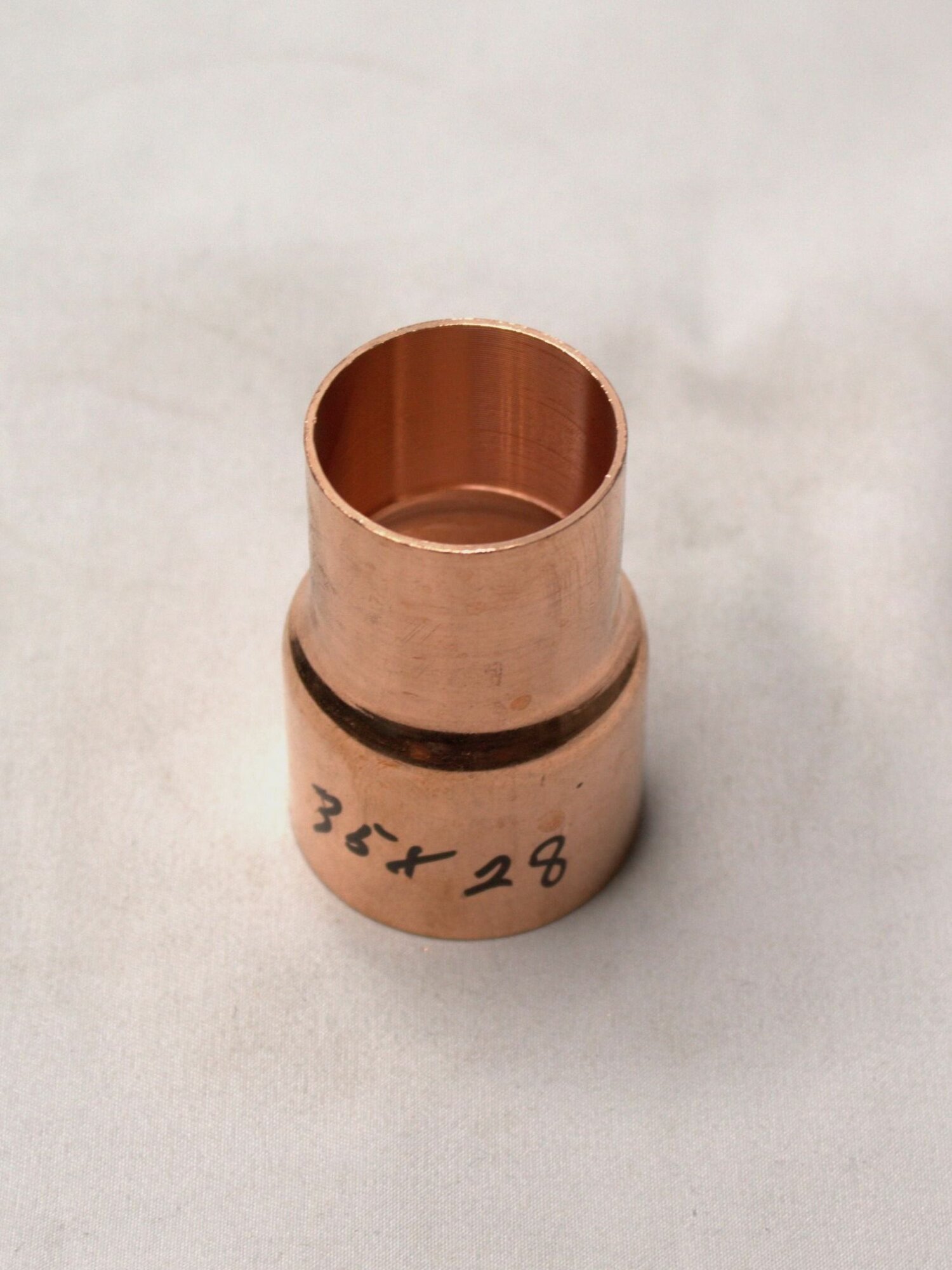 Муфта медная двухраструбная переходная 35х28