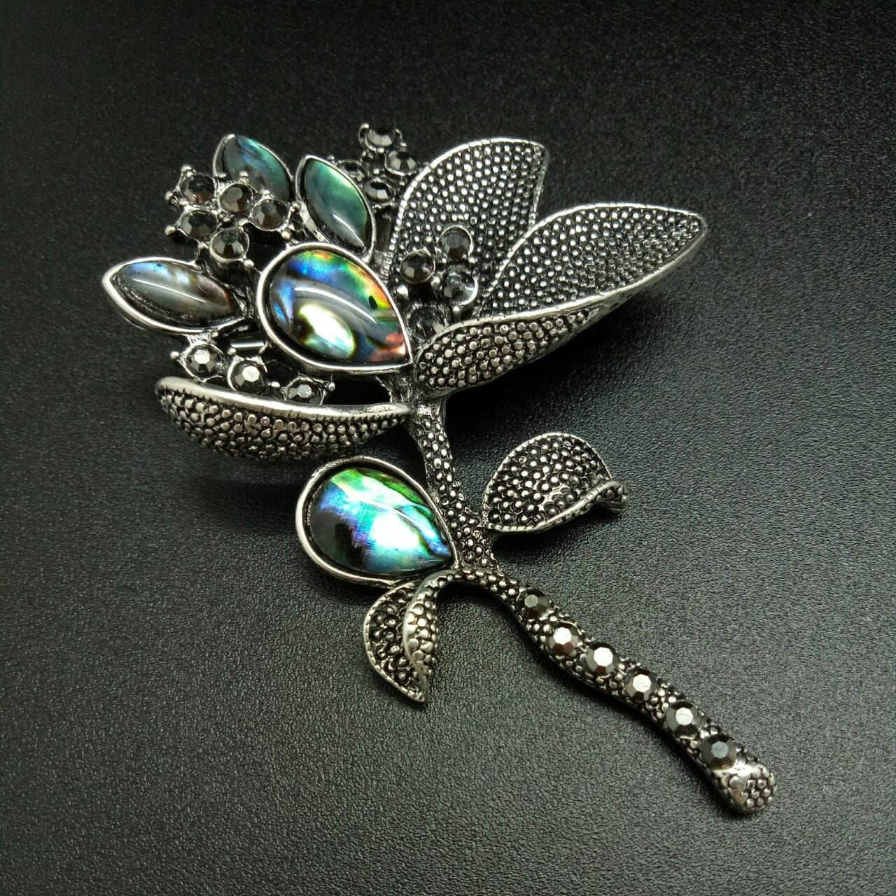 Брошь, гелиотис