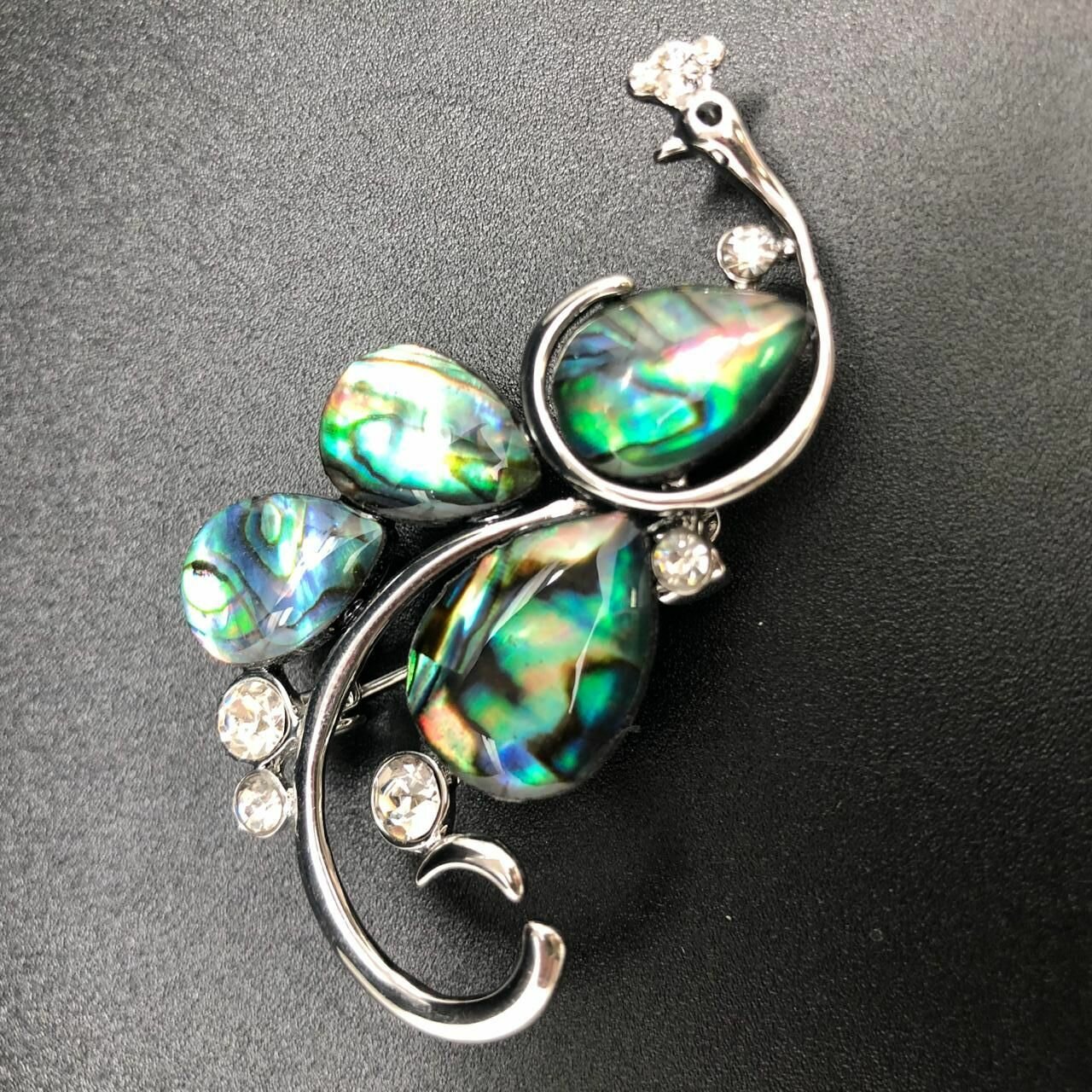 Брошь, гелиотис