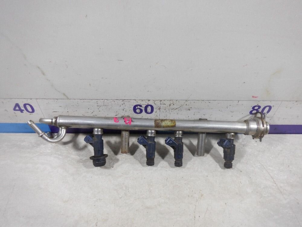 Форсунка топливная VW Passat B3 06B133551M