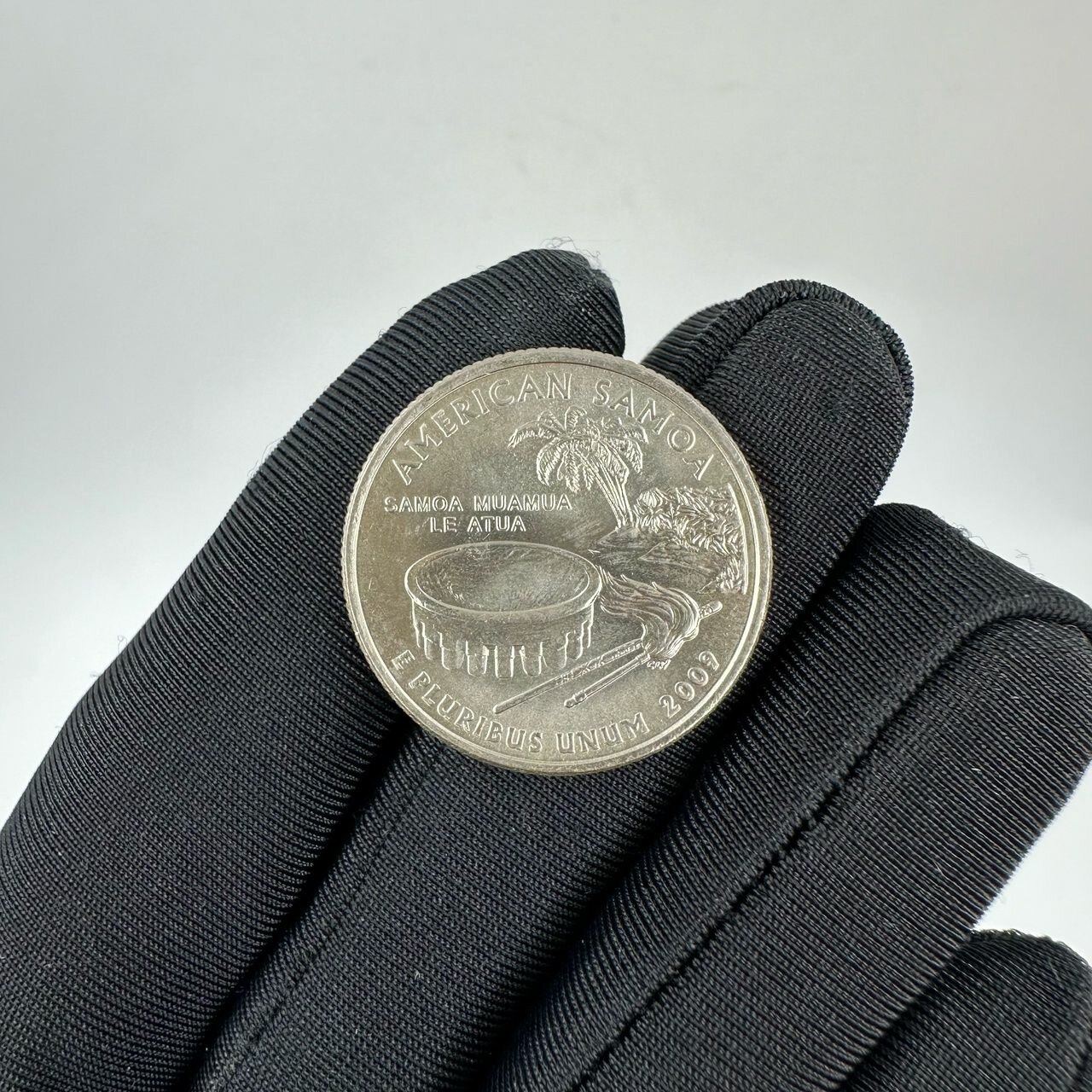 Монета 25 центов 2009 год Американское Самоа (American Samoa) Двор D