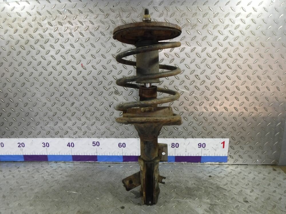 Амортизатор передний левый Volvo V40