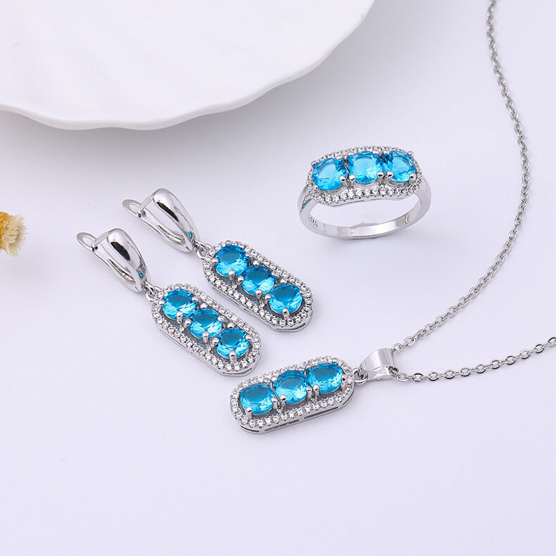 Комплект бижутерии: колье, серьги, браслет, циркон