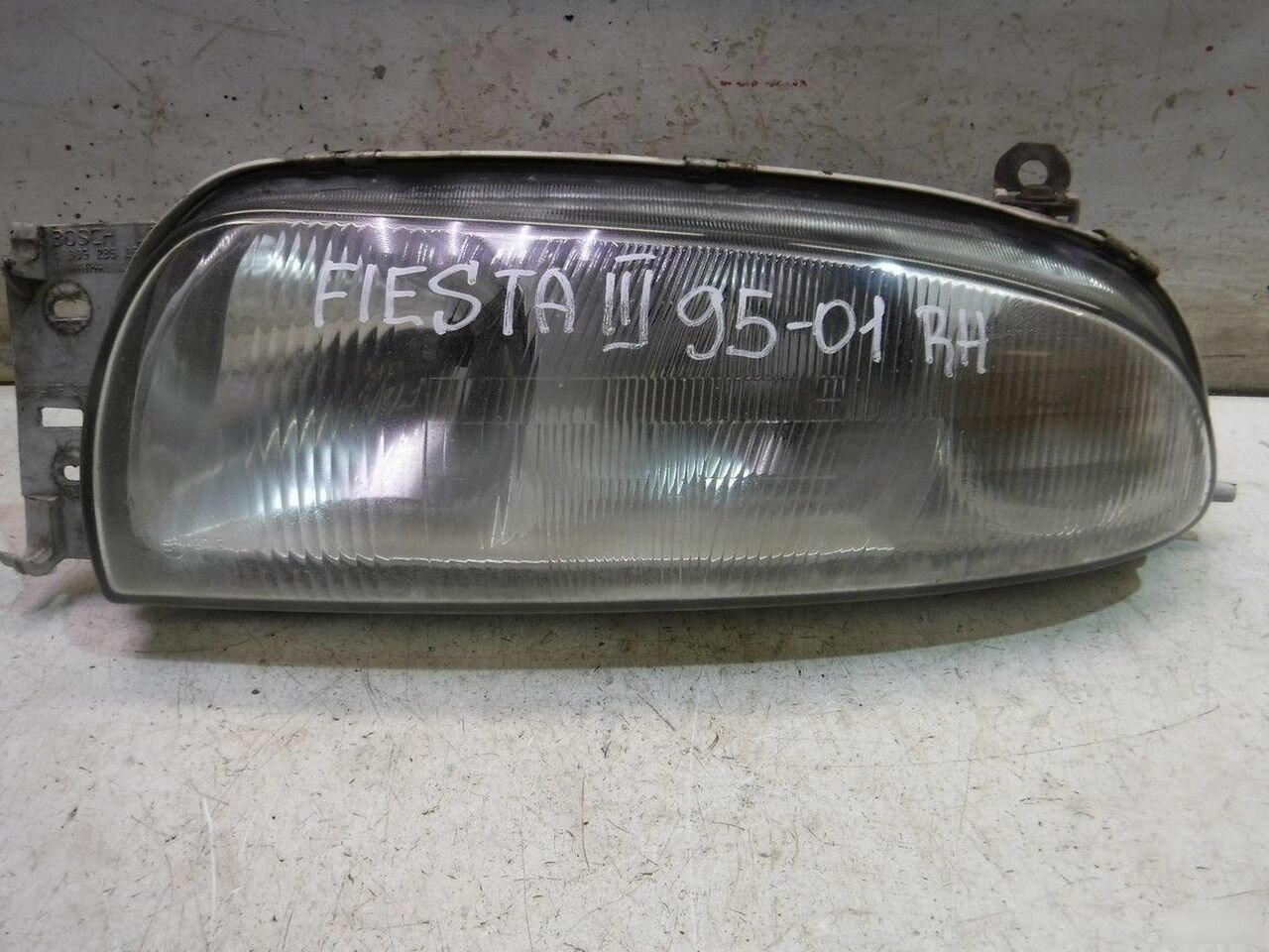 Фара левая Ford Fiesta Mk4 (1995—1999) 96FG13006AD 96FG13005AD