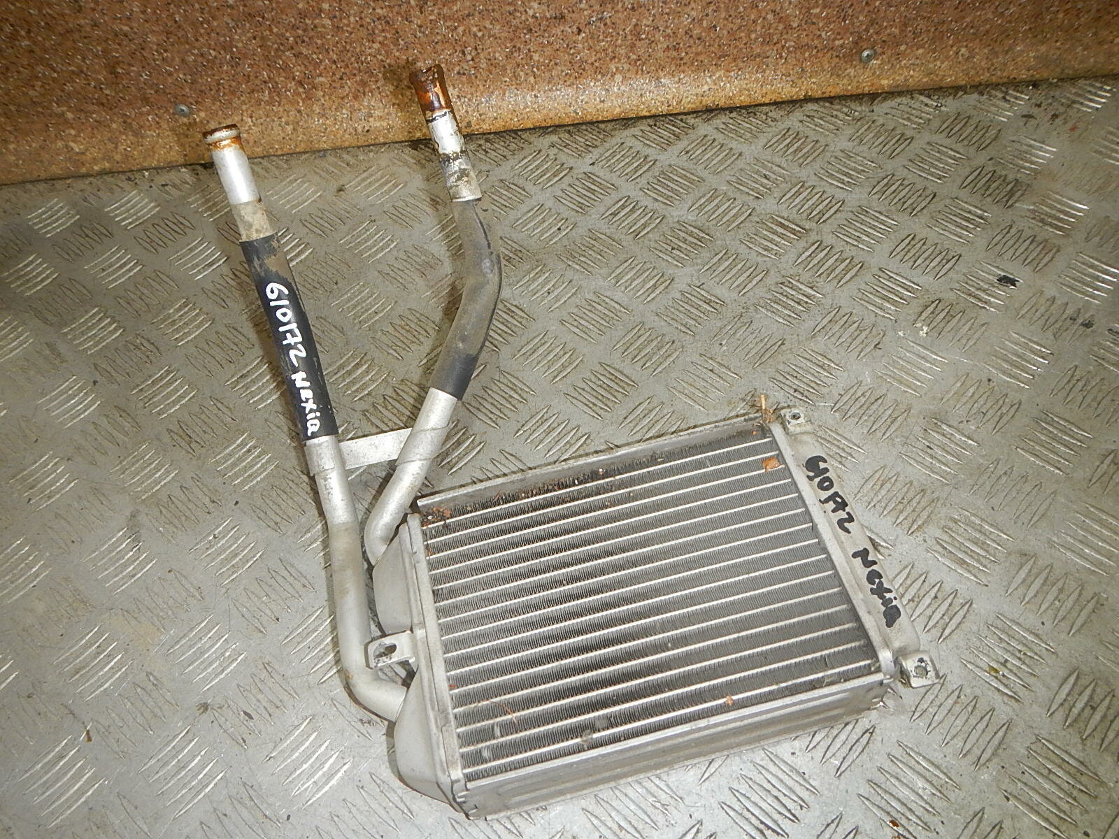 Б/У Радиатор отопителя, Daewoo (Дэу)-NEXIA (07-16) DAEWOO NEXIA (07-16) Без видимых повреждений. 610172 GENERAL MOTORS а...