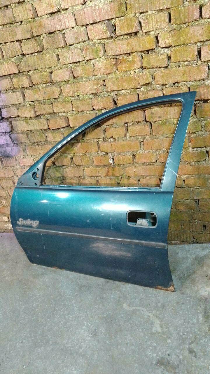 Дверь передняя левая Opel Corsa B 1996