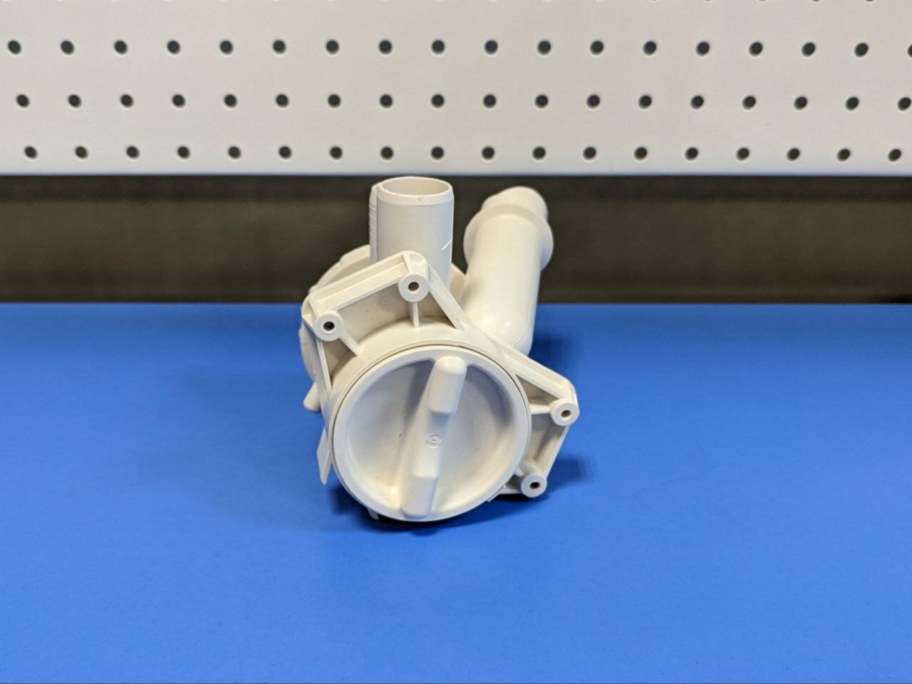 Корпус фильтра помпы (улитка с заглушкой) СМА Haier RTXS G584TMHR-07