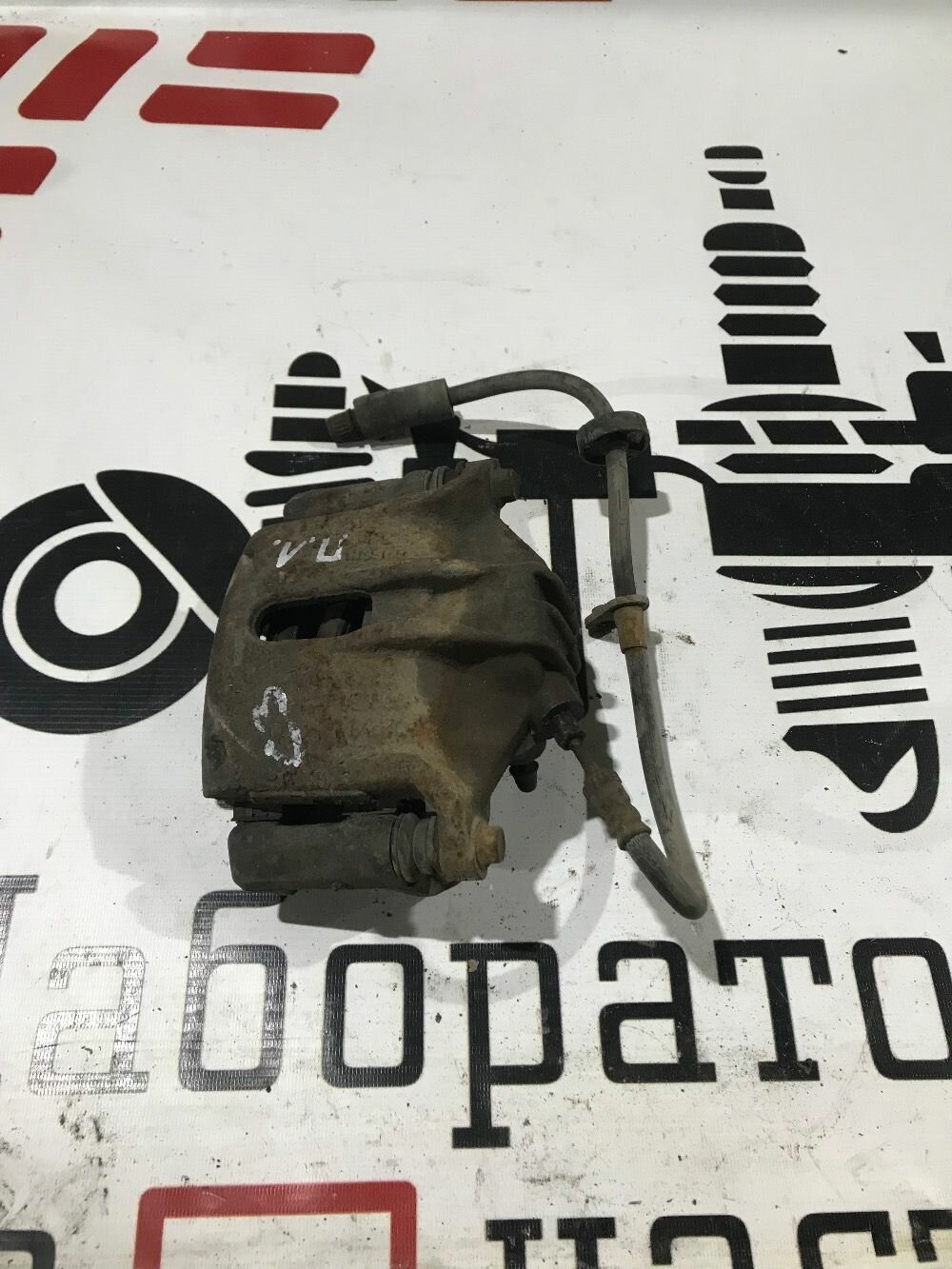 Суппорт тормозной передний левый Citroen C3 Picasso I (2009—2012) 4401P8