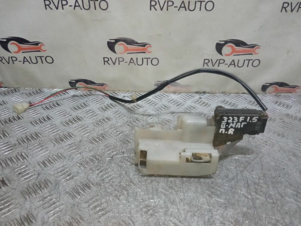 Замок двери передний правый Mazda 323F (Мазда) Mazda