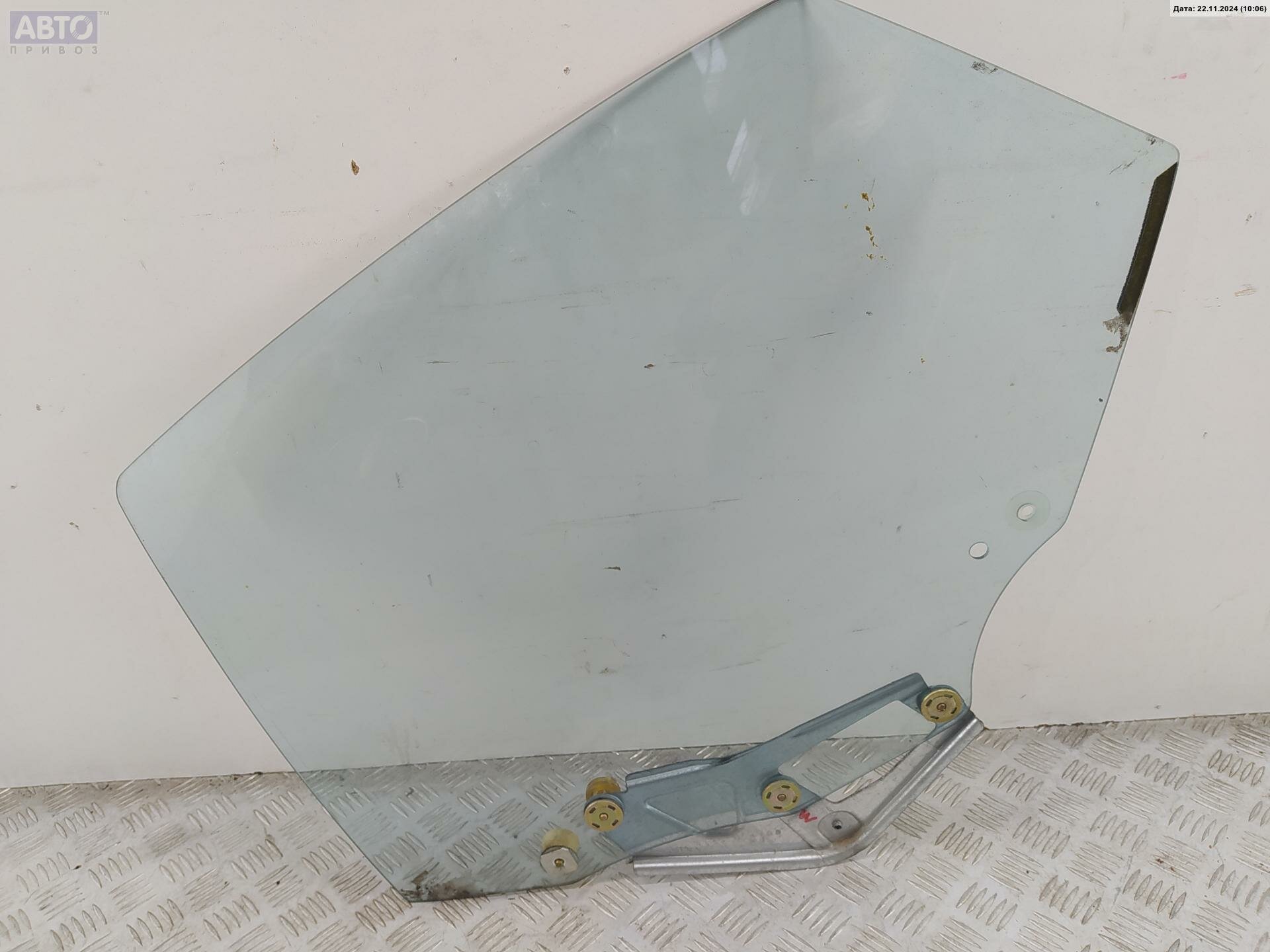 Стекло двери задней левой Mazda 323 (1994-1998) BA