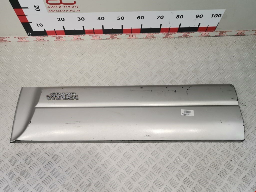 Накладка (молдинг) двери передней левой Suzuki Grand Vitara 1 7768065DC0 арт. 1000286