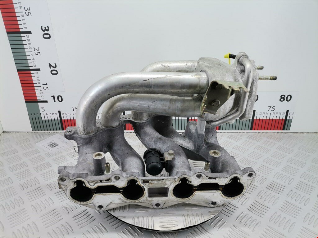 Коллектор впускной Mazda 323 BA Z55213100A арт. 1953758