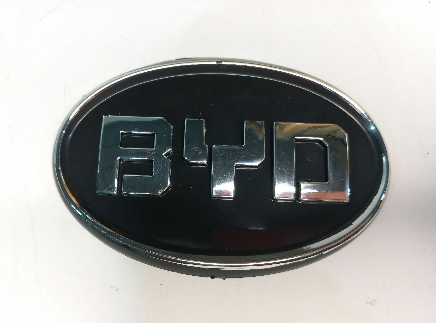 Эмблема решетки радиатора BYD F3 [1.5 16V 5MT седан] 1017118600
