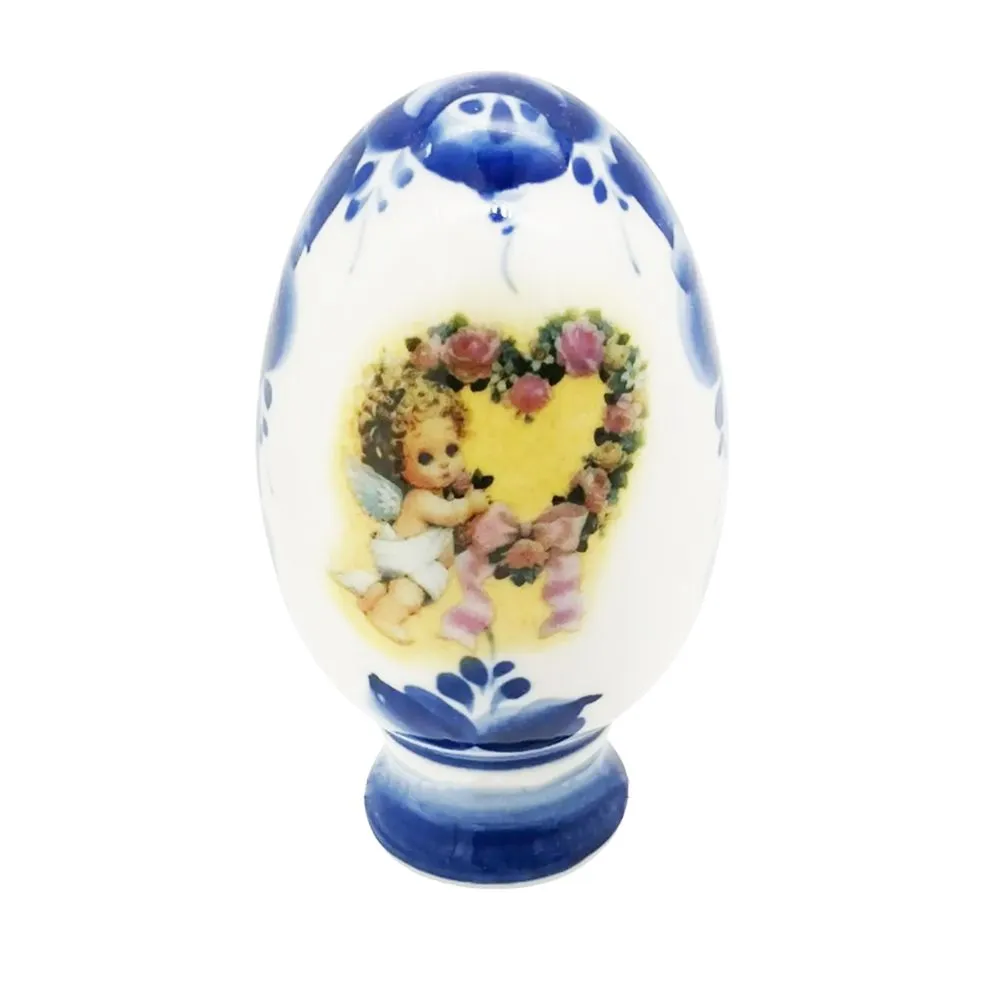 Фарфоровая фигурка ручной работы пасхальное яйцо "Ангелочек с сердечком", (Гжель)