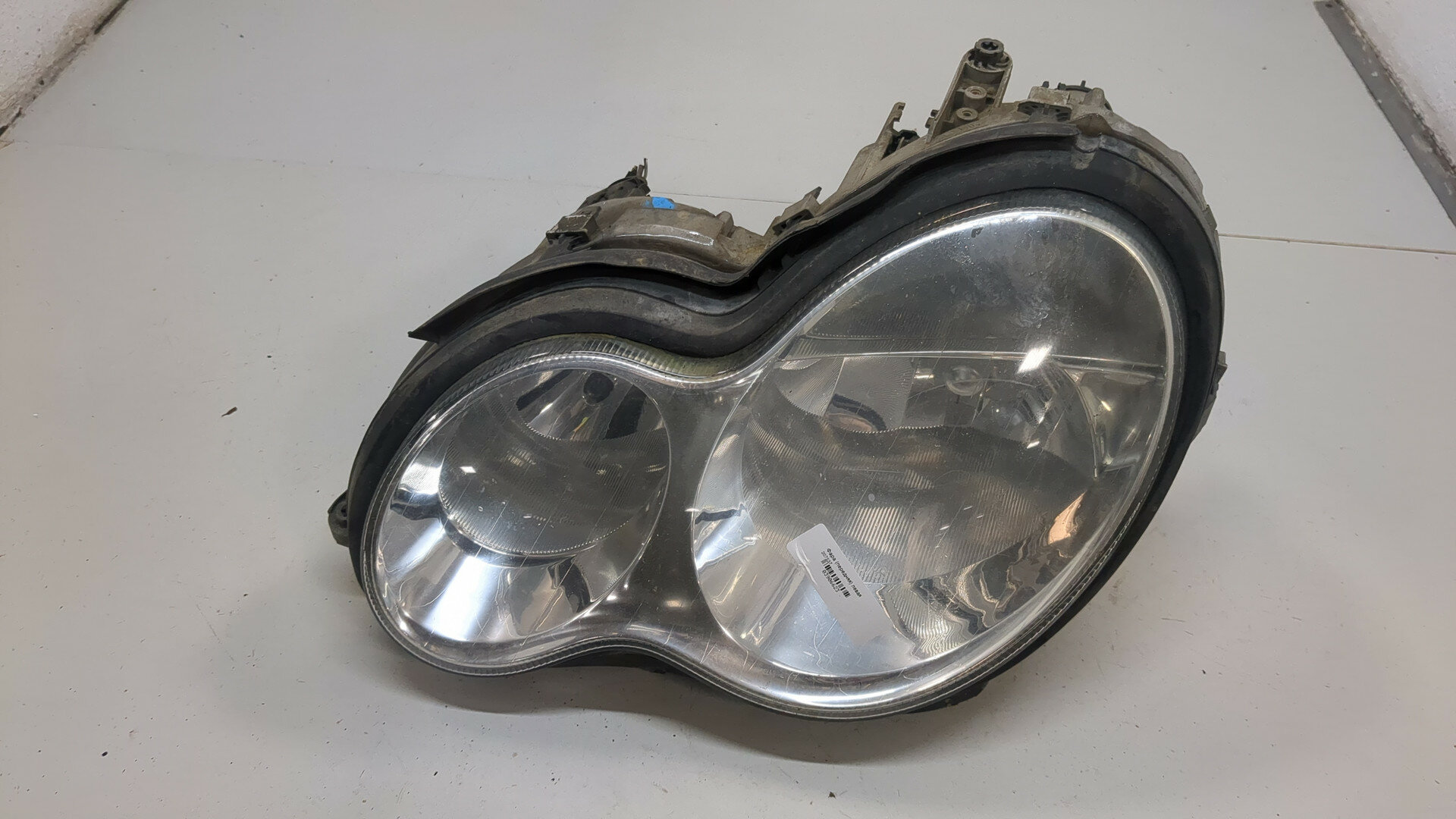 Фара (передняя) левая Mercedes C W203 Б/У