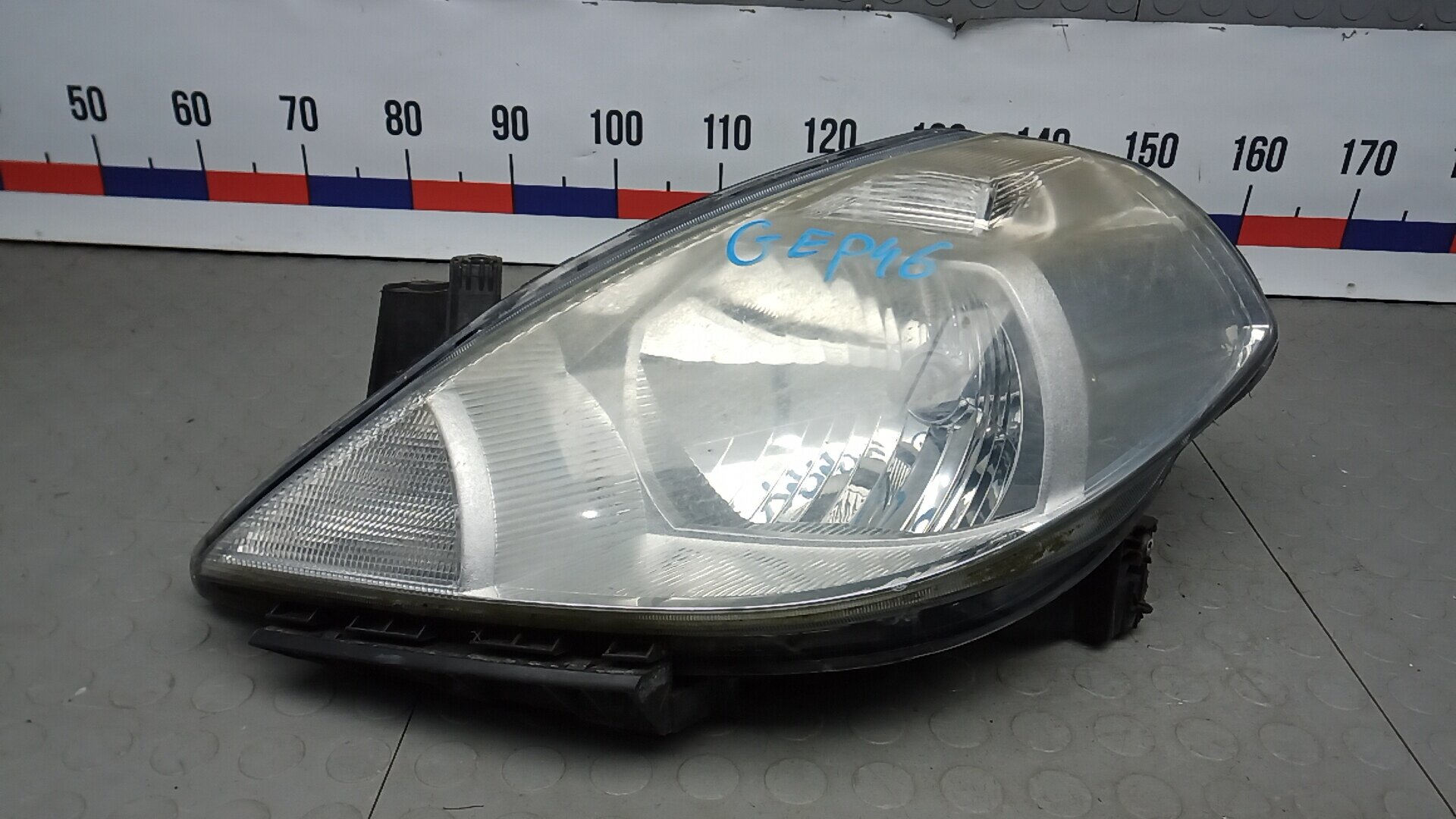 Фара левая NISSAN TIIDA C11X