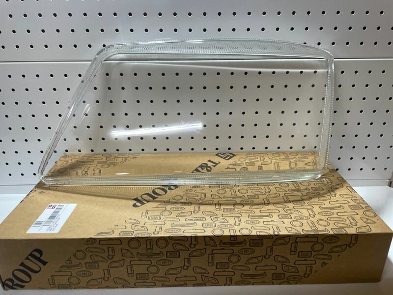 Стекло фары левое MAN TGS TGX