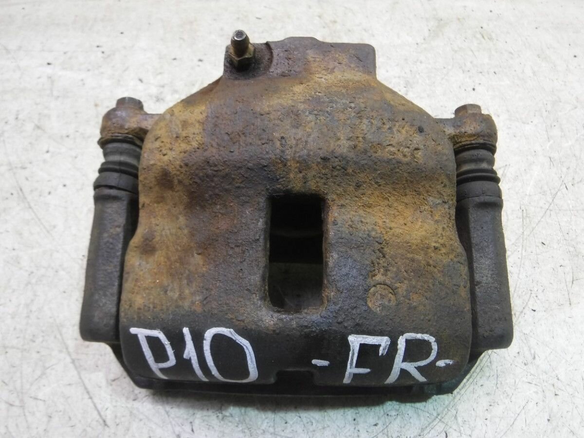 Суппорт тормозной передний правый Nissan Primera P10 (1990—1995) 410013F000
