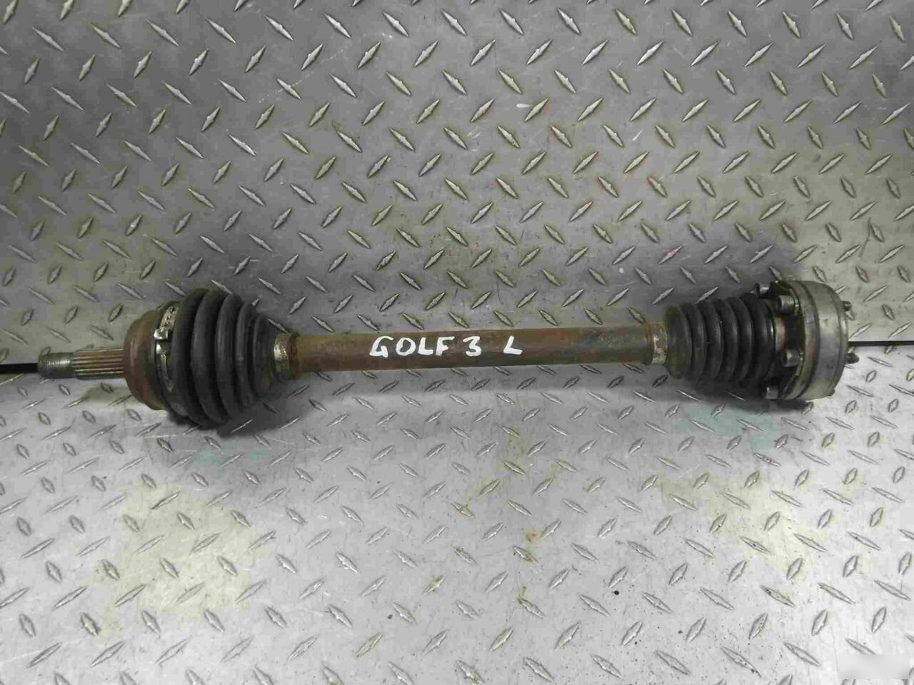 Полуось передняя левая Volkswagen Golf Mk3 (1991—2000) 1H0407271F
