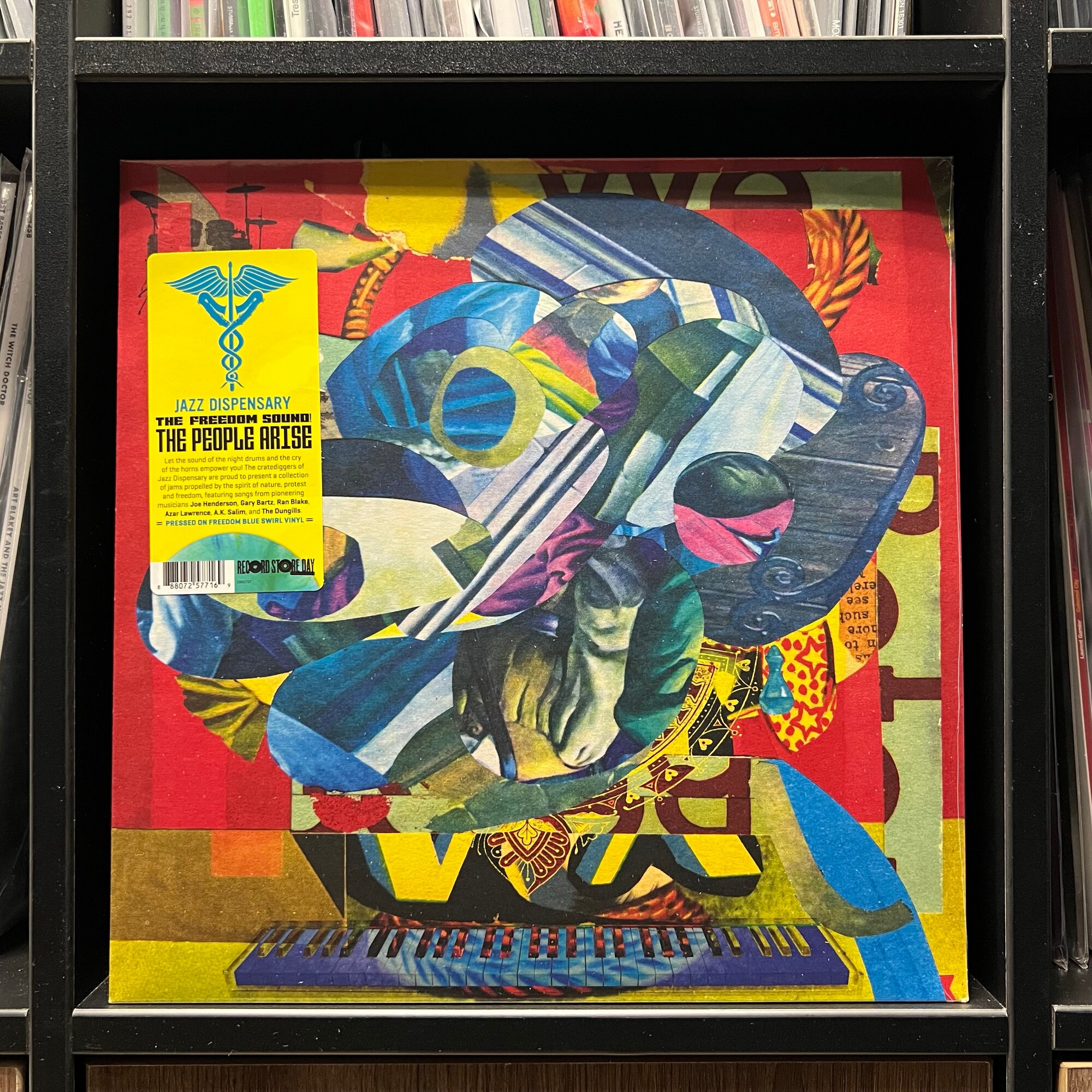 Виниловая пластинка VARIOUS - Jazz Dispensary - The Freedom Sound! The People Arise (Record Store Day RSD 2024) (still sealed, 'freedom blue swirl' translucent blue smokey vinyl LP in spot-varnished sleeve) LP Винил