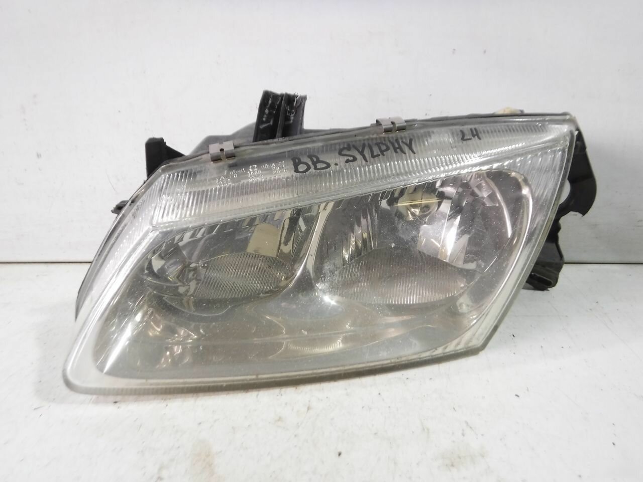 Фара левая Nissan Bluebird Sylphy I (2000—2005) 26060BM825