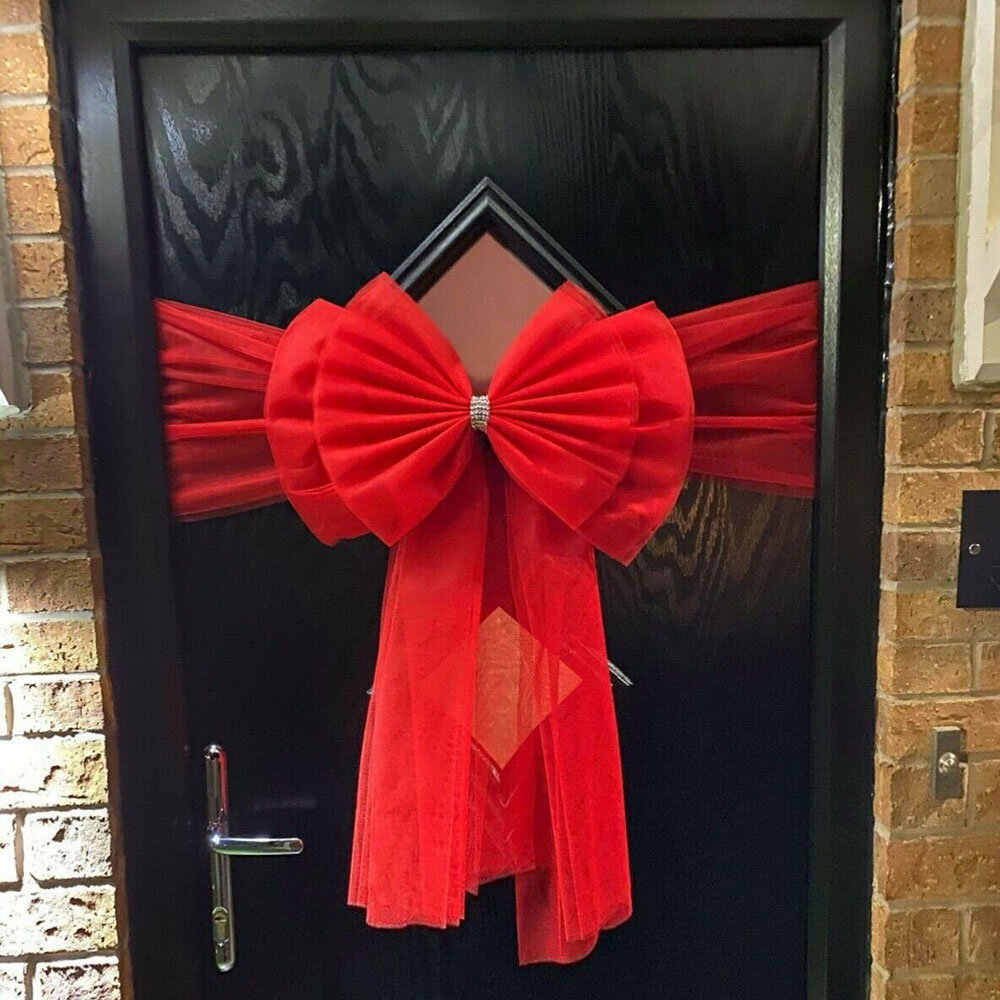 Рождественский бант из ленты для украшения двери