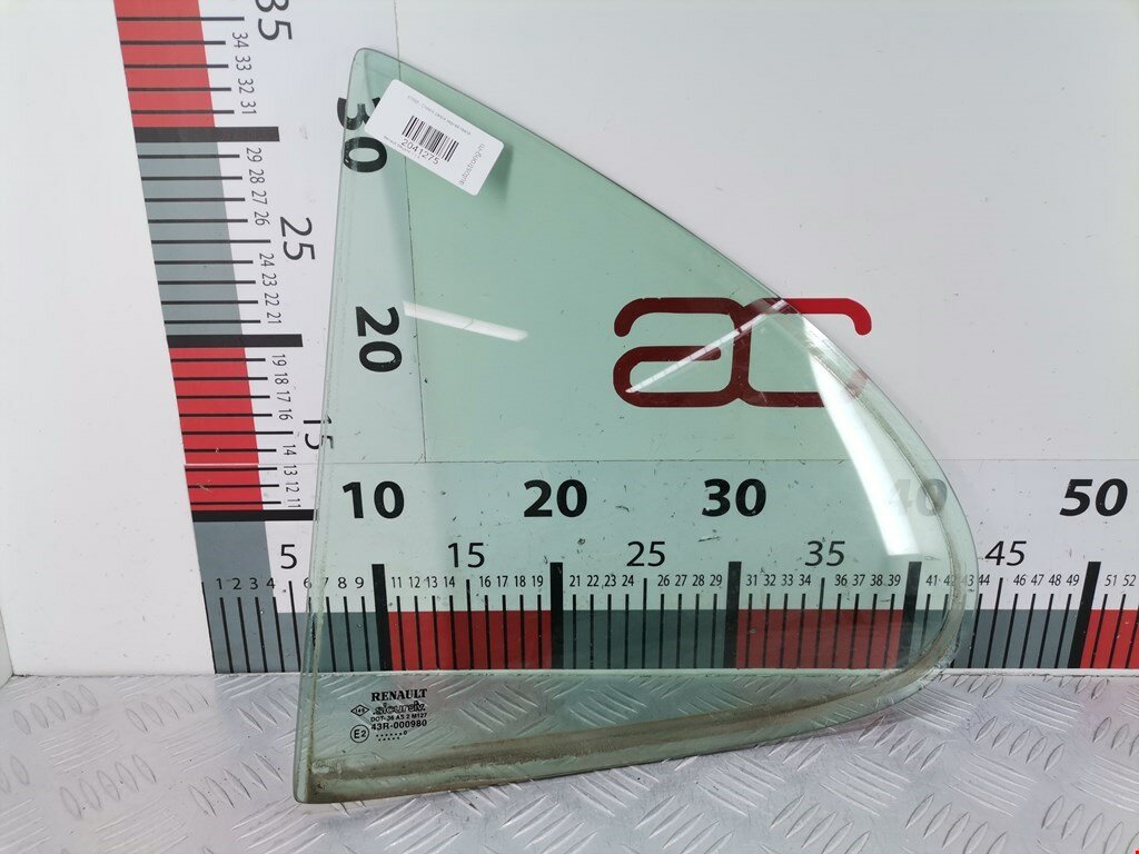 Стекло двери задней левой (форточка) Renault Megane 1 арт. 2041275