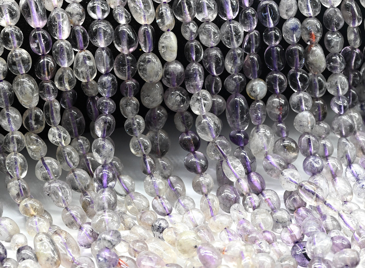 Бусины из аметиста галтовка 5*8мм, 38см, 51 бусина .