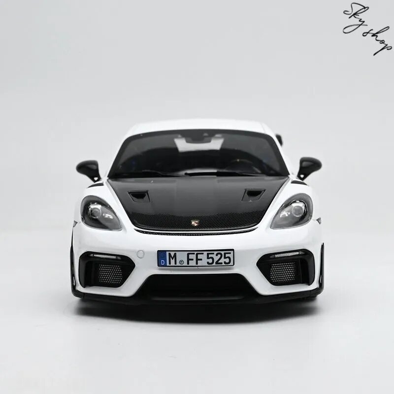 Игрушечная машинка Porsche 718 Cayman GT4 RS, масштаб 1:10, белого цвета, открывающиеся двери и капот — фото 1