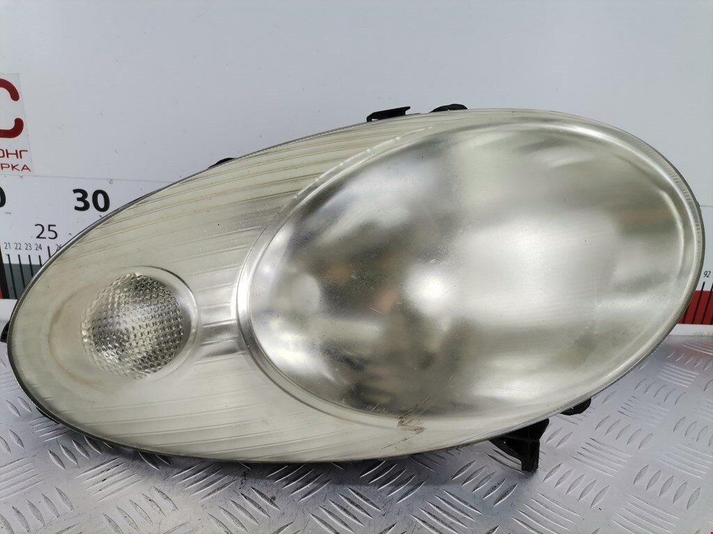 Фара левая Nissan Micra K12 26060AX700 арт. 1530187