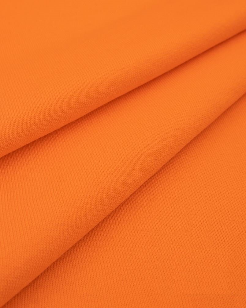 Ткань Футер 2-х нитка пенье. Состав: 73% хлопок, 22% пэ, 5% лайкра. Цвет оранжевый. Готовый отрез 3*1,85 м.