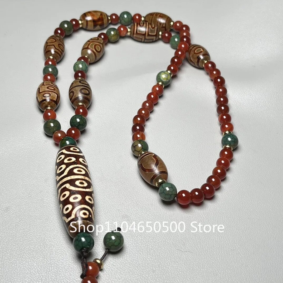 Бусины дзи из агата