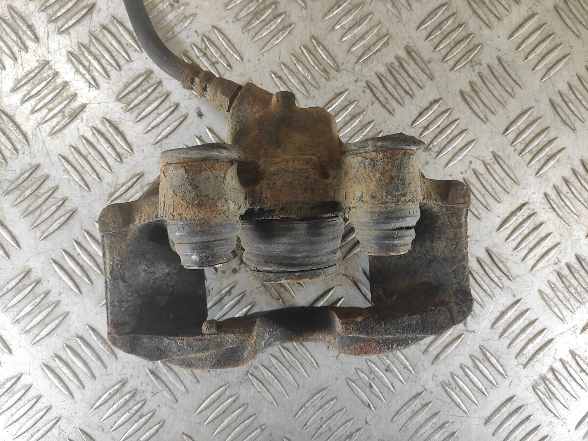 Суппорт передний левый RENAULT R19 1992 2002 7701201769