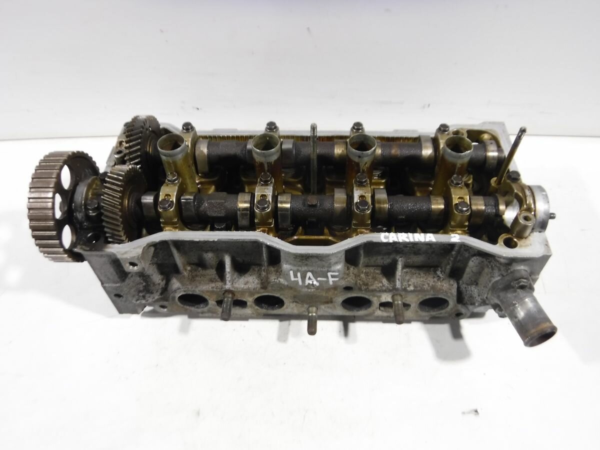 Головка блока цилиндров Toyota Carina T170 (1987—1993) 1110119235