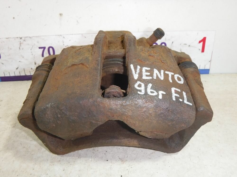 Суппорт передний левый VW Vento