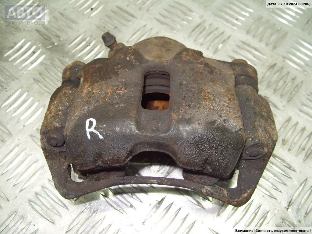 Суппорт передний правый Nissan Primera P11 (1996-1999)