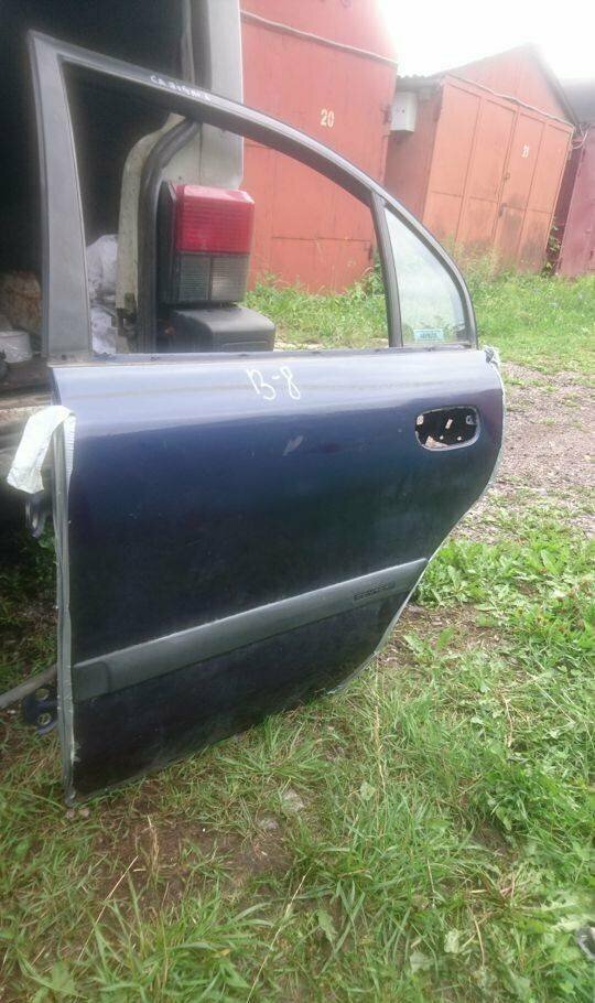 Дверь задняя левая Mitsubishi Carisma рест. 2003