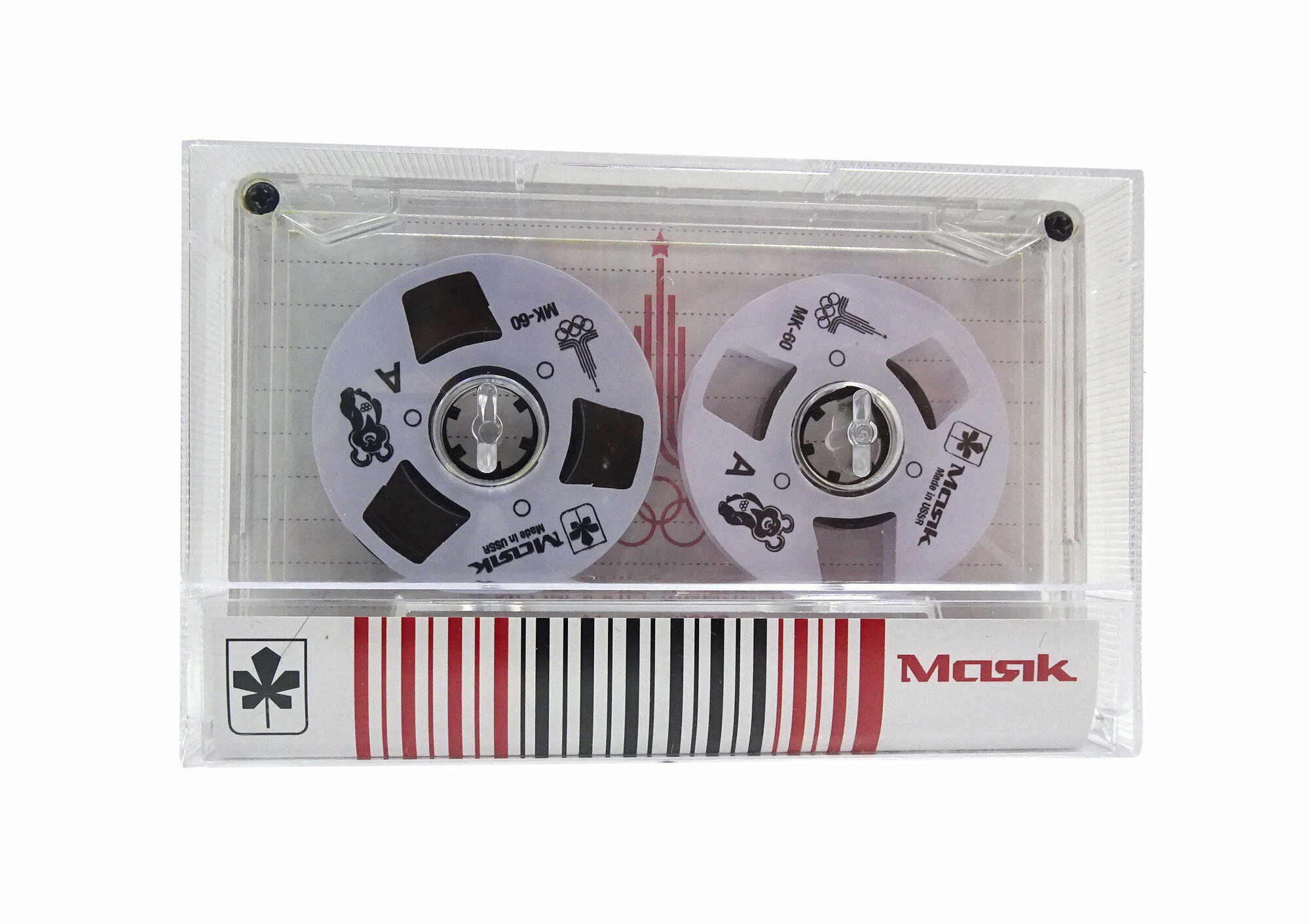 Аудиокассета с боббинками "Маяк" запечатанная новая белого цвета в светлом корпусе