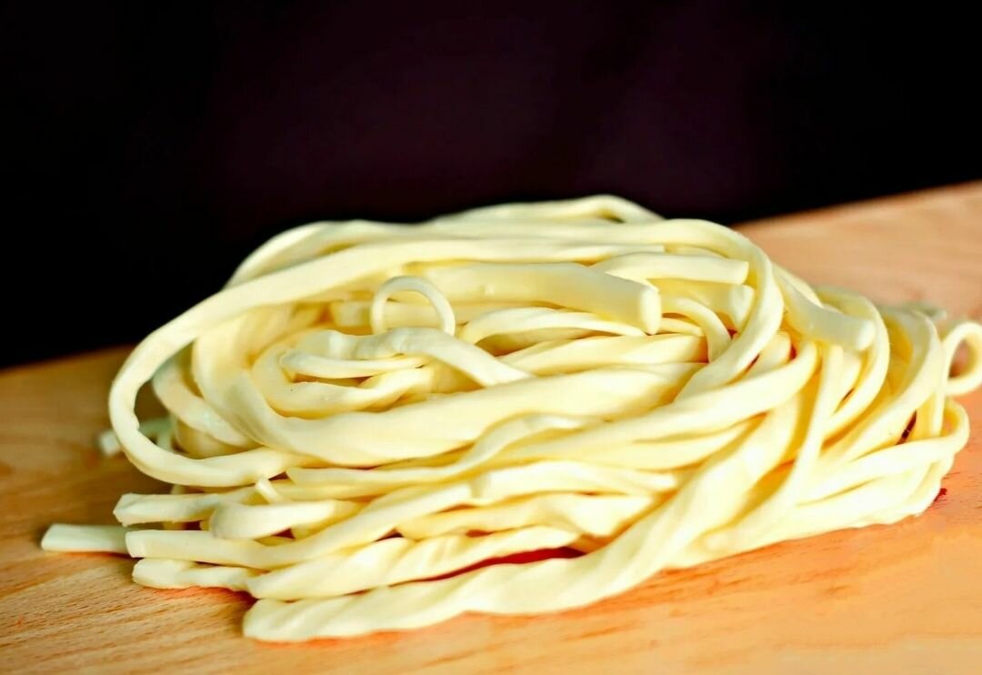 *Сулугуни* пряди в вакуумной упаковке 1кг.