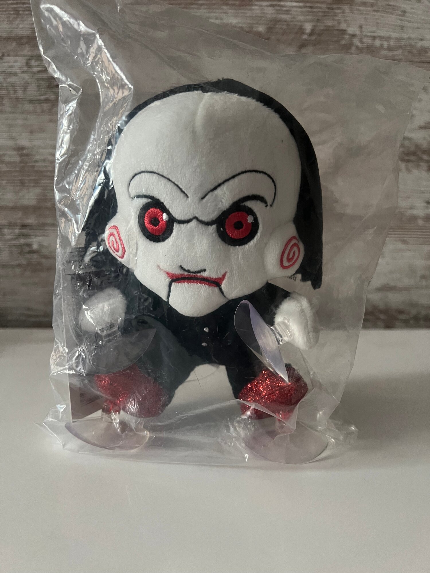 Фигурка Пила мягкая от Kidrobot на липучках.