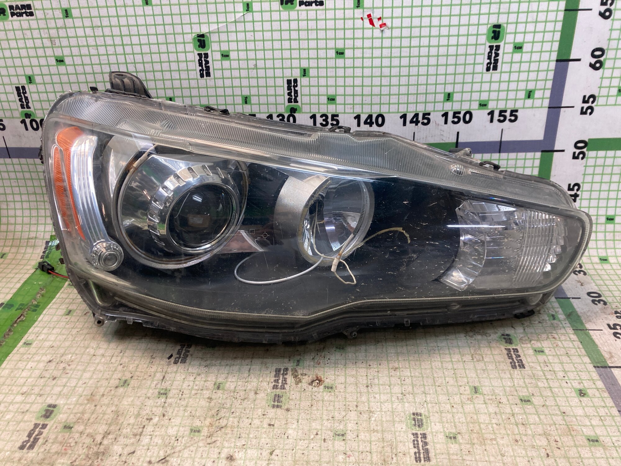 Фара правая Mitsubishi Lancer X