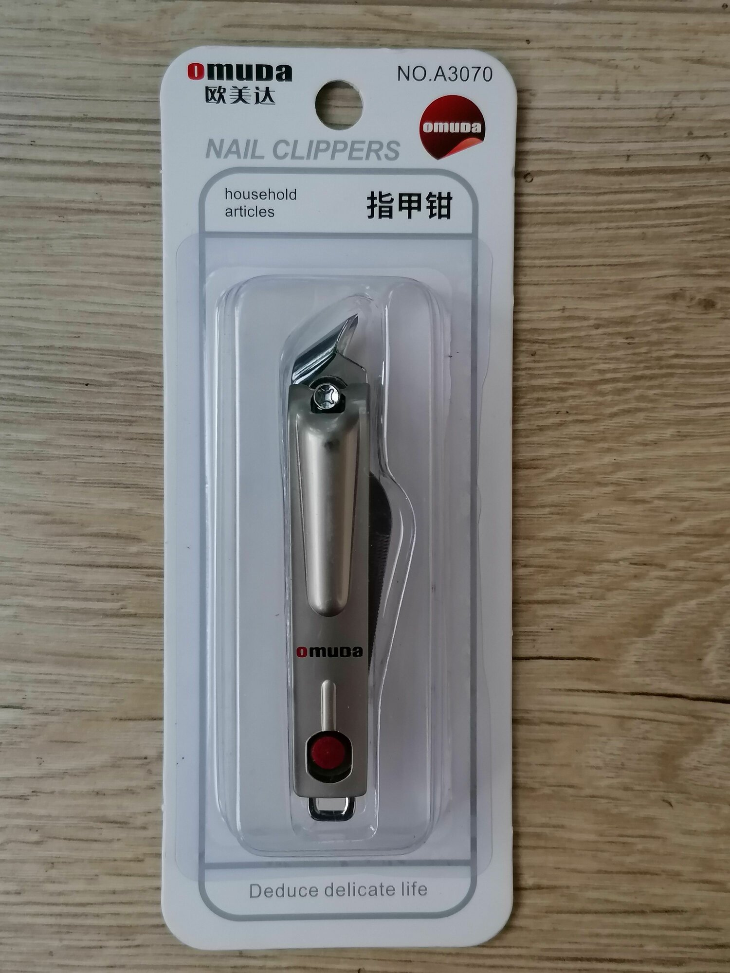 Книпсер со скошенным лезвием - кусачки с пилкой для ногтей OMUDA