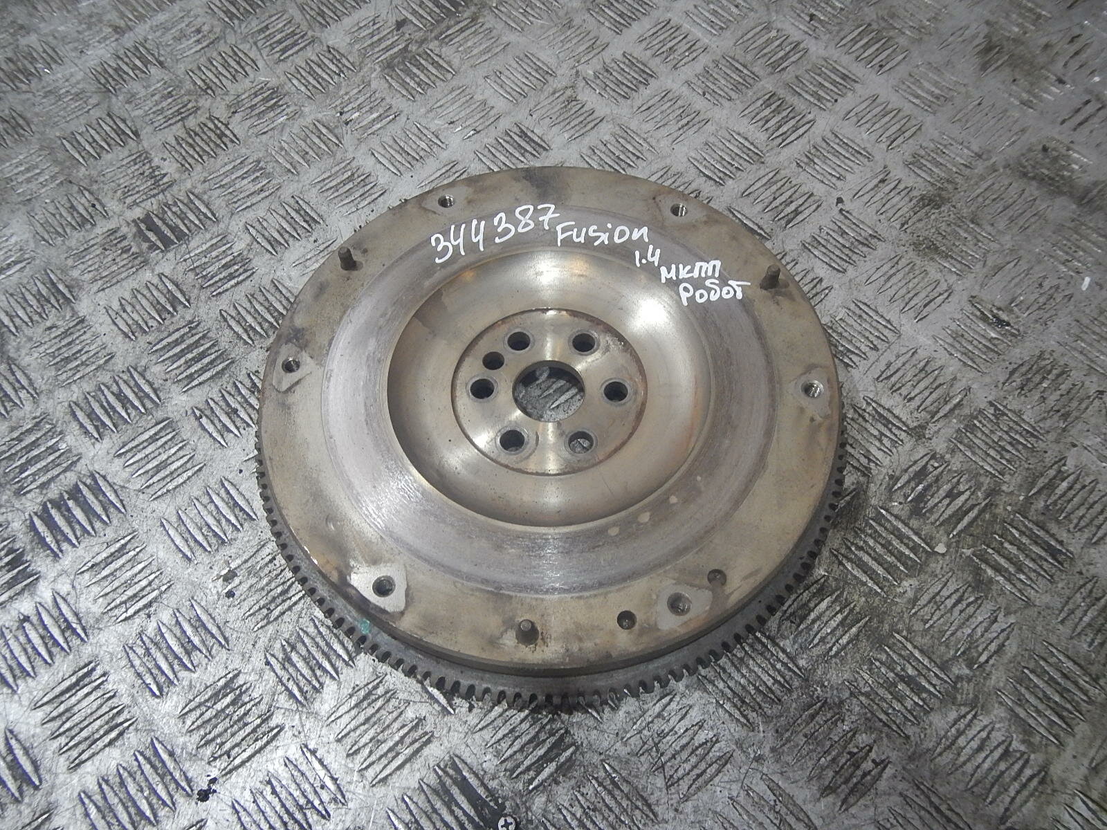 Б/У Маховик, Ford (Форд)-FUSION (02-) FORD FUSION (02-12) 1.4 робот Без повреждений. 344387 FORD арт. 96MM6375AH