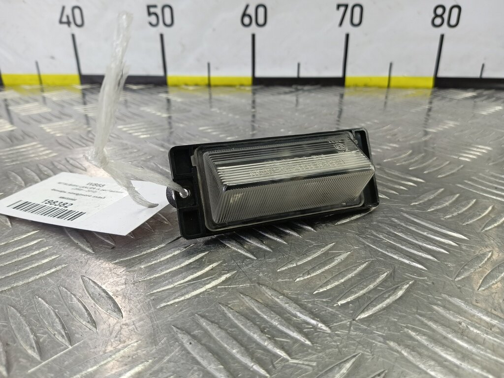 Фонарь номерного знака Б/У для MITSUBISHI LANCER IX рестайлинг (2005—2010) MR485699