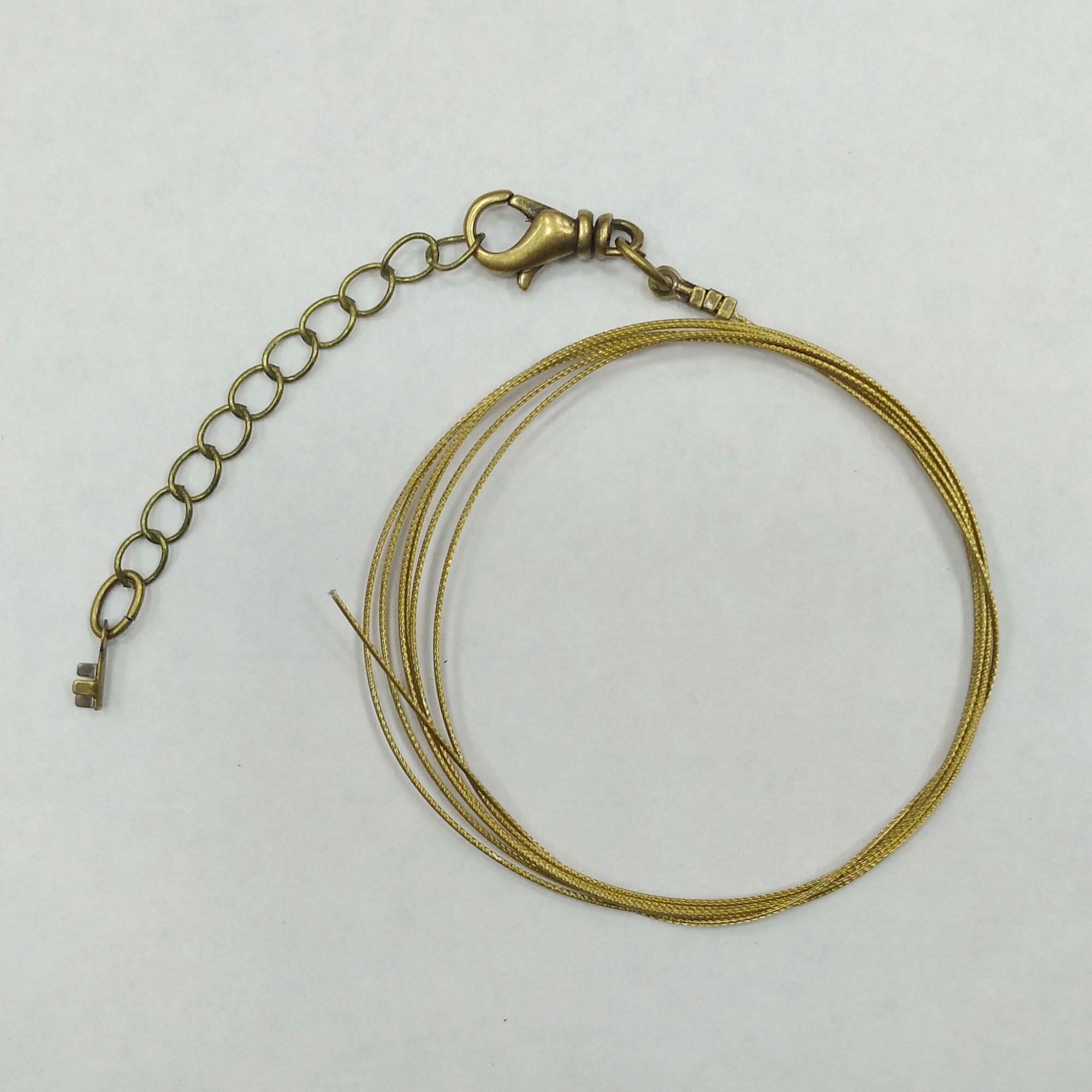 Набор для бус (колье, браслета), тросик с концевиками, карабином и удлинителем, базовый материал - сталь, цвет античное золото (светлая бронза), 1 метр + 7 см