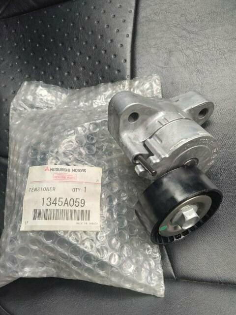 Натяжитель ремня Mitsubishi 1345A059 CITROEN C-CROSSER/PEUGEOT 4007/MITSUBISHI ASX/LANCER/OUTLANDER 06->